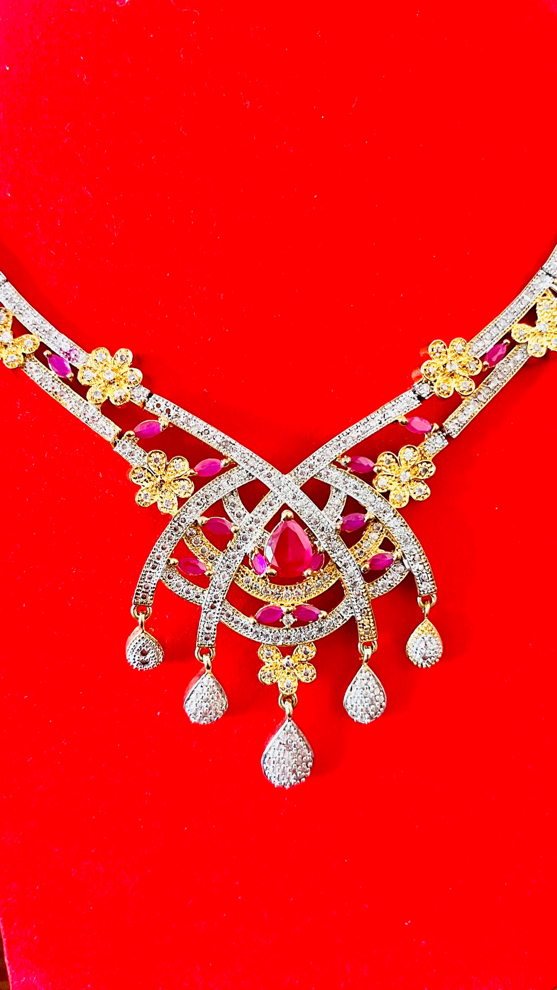 American Diamond White & Ruby Stone Studded Golden Flower Design ...